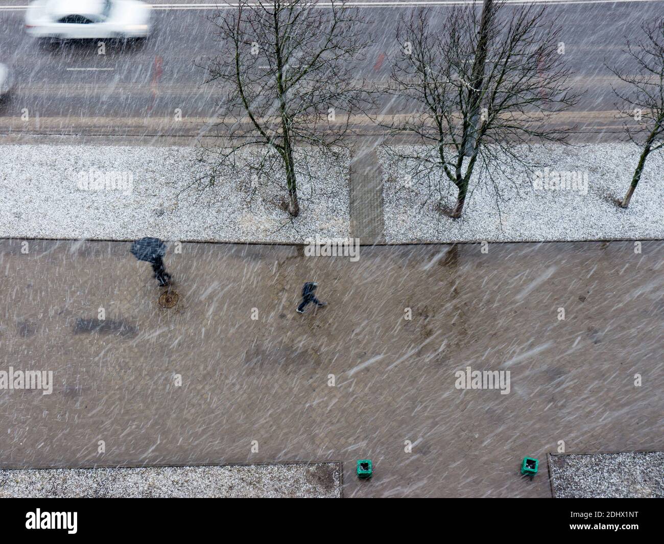 The Architecture backgrounds and objects. Sidewalk. Snowfall. View from ...