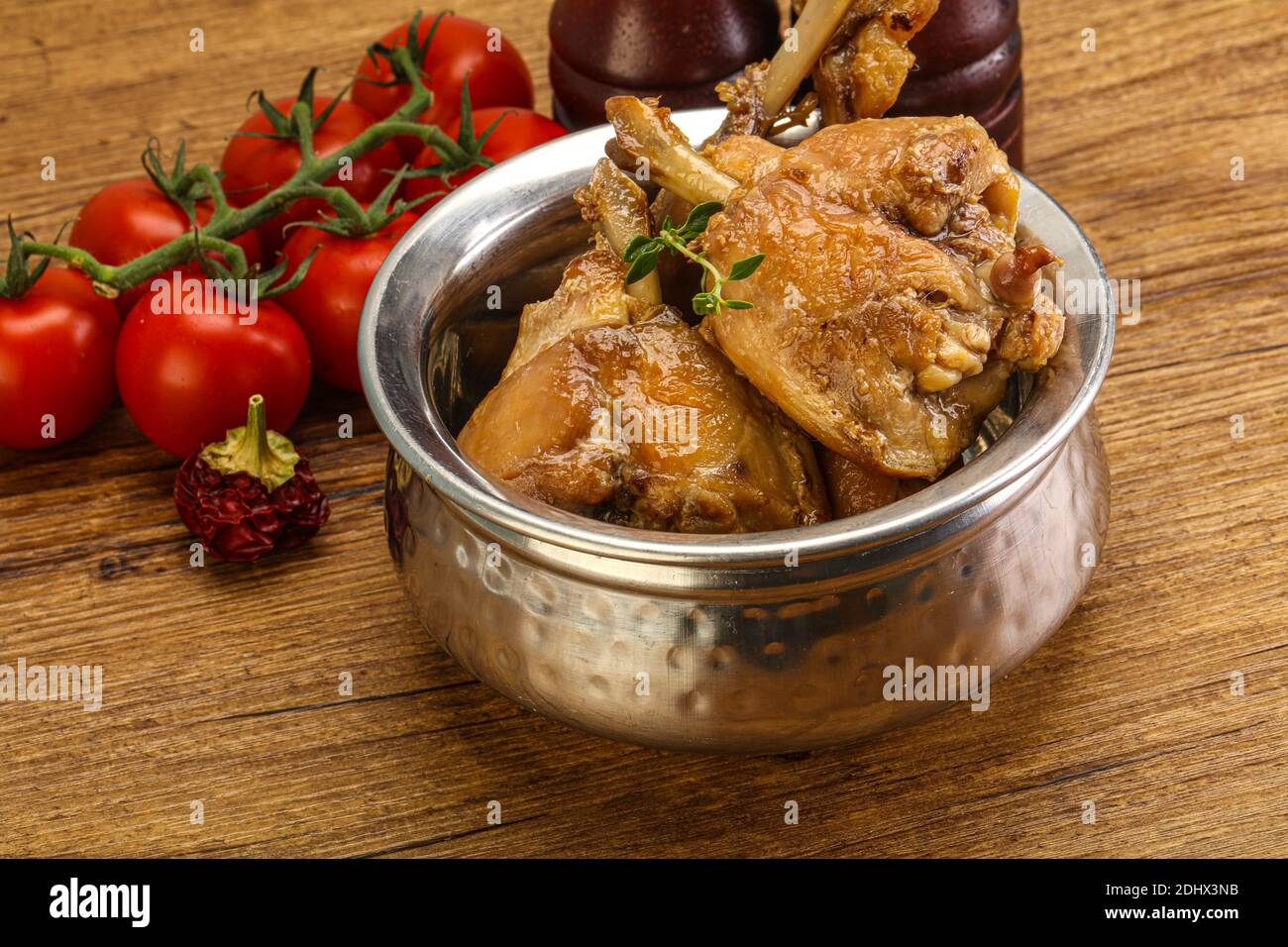 Rabbit stew in sweet and spicy sauce Stock Photo - Alamy