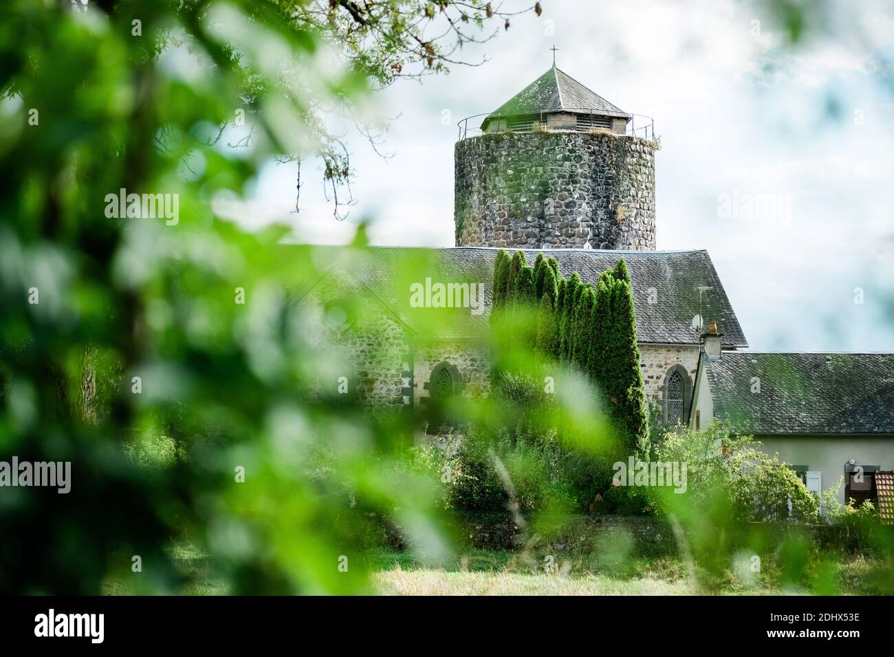 A typical french tower constructed with rocks in the countryside ...