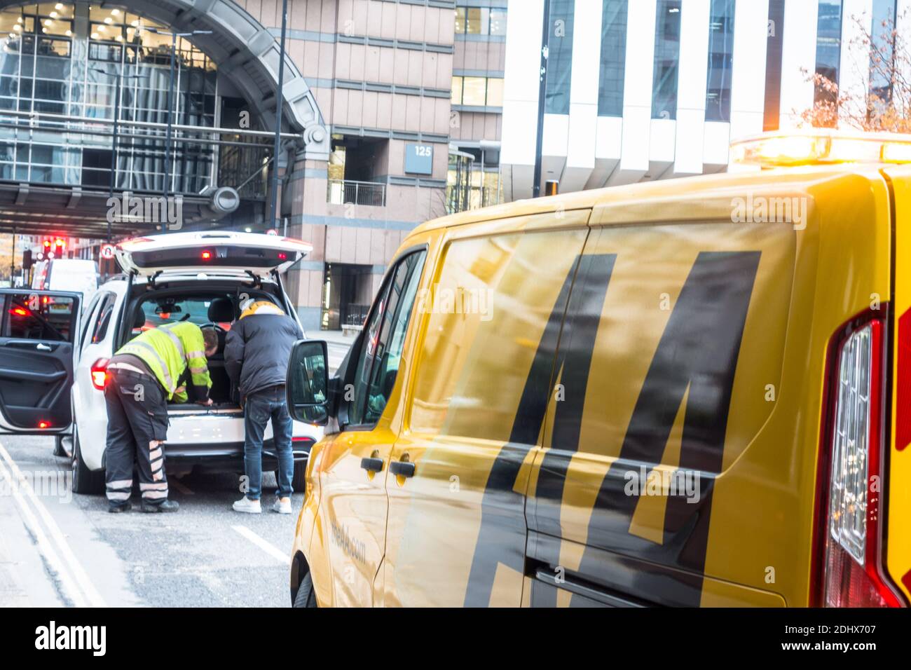 Car breakdown roadside fixing by AA service Stock Photo - Alamy