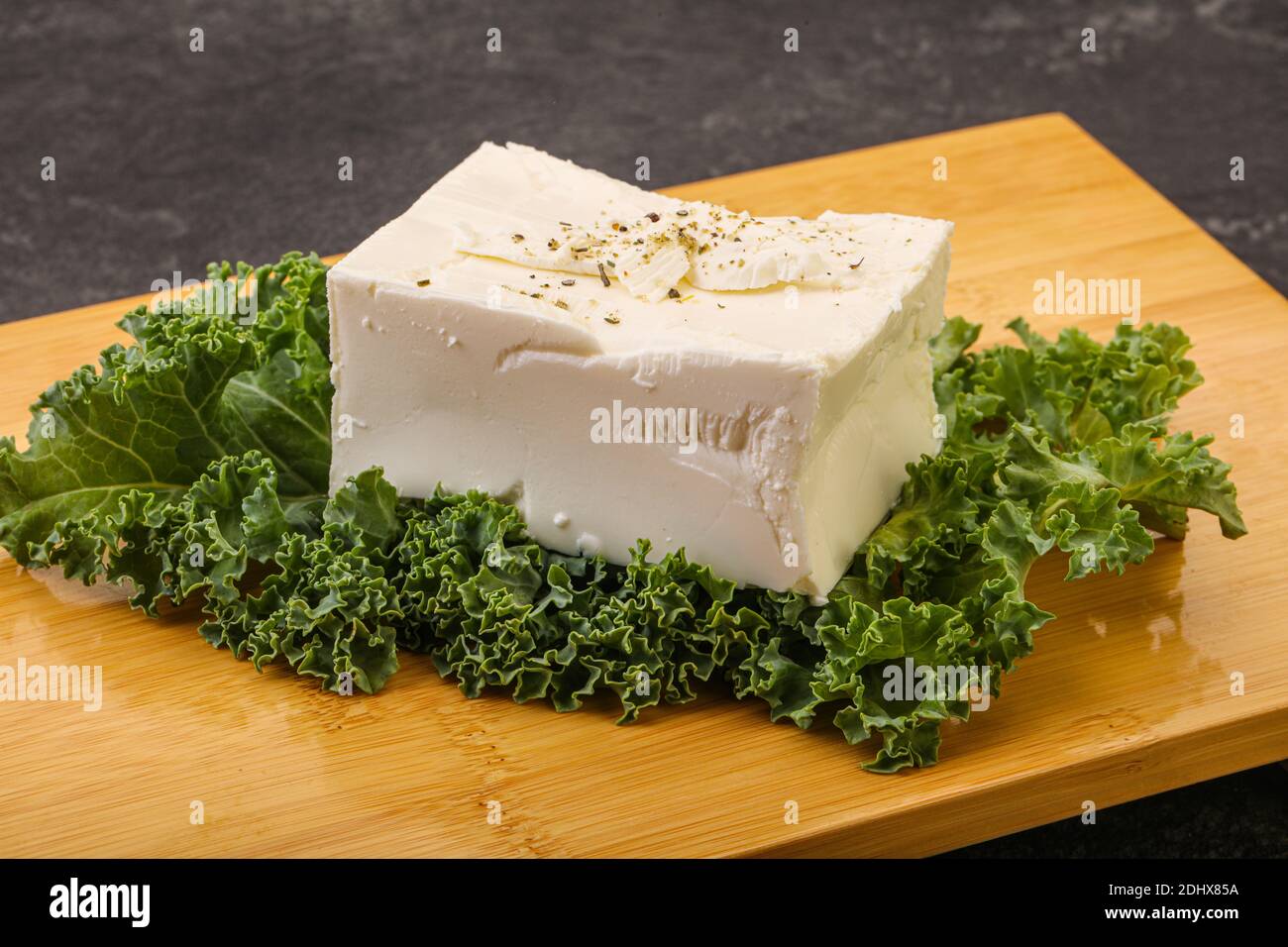 Traditional tasty Greek Feta soft cheese brick Stock Photo - Alamy