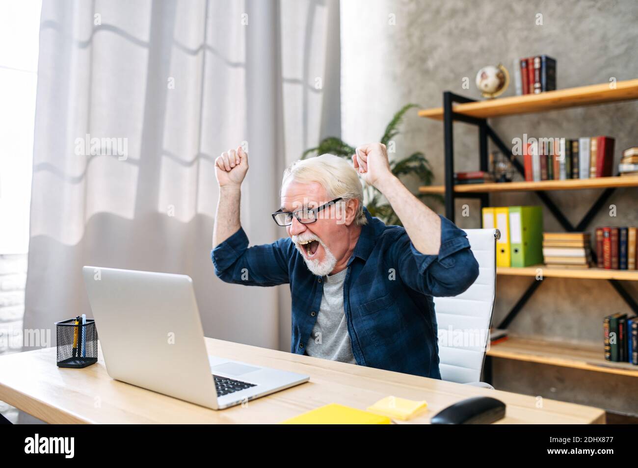 Older middle aged man working in office hi-res stock photography and ...
