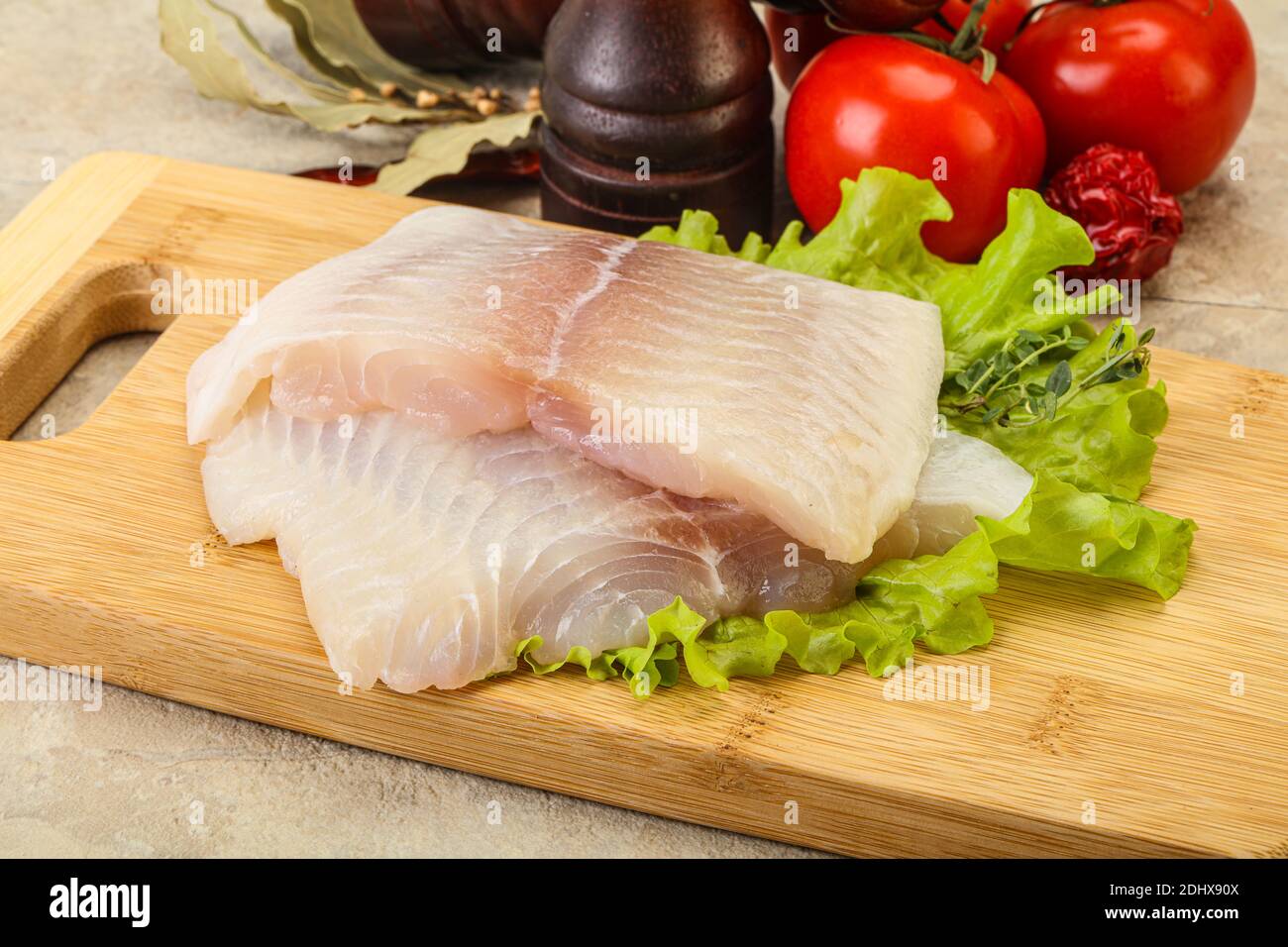 Raw pangasius fillet fish for cooking Stock Photo - Alamy