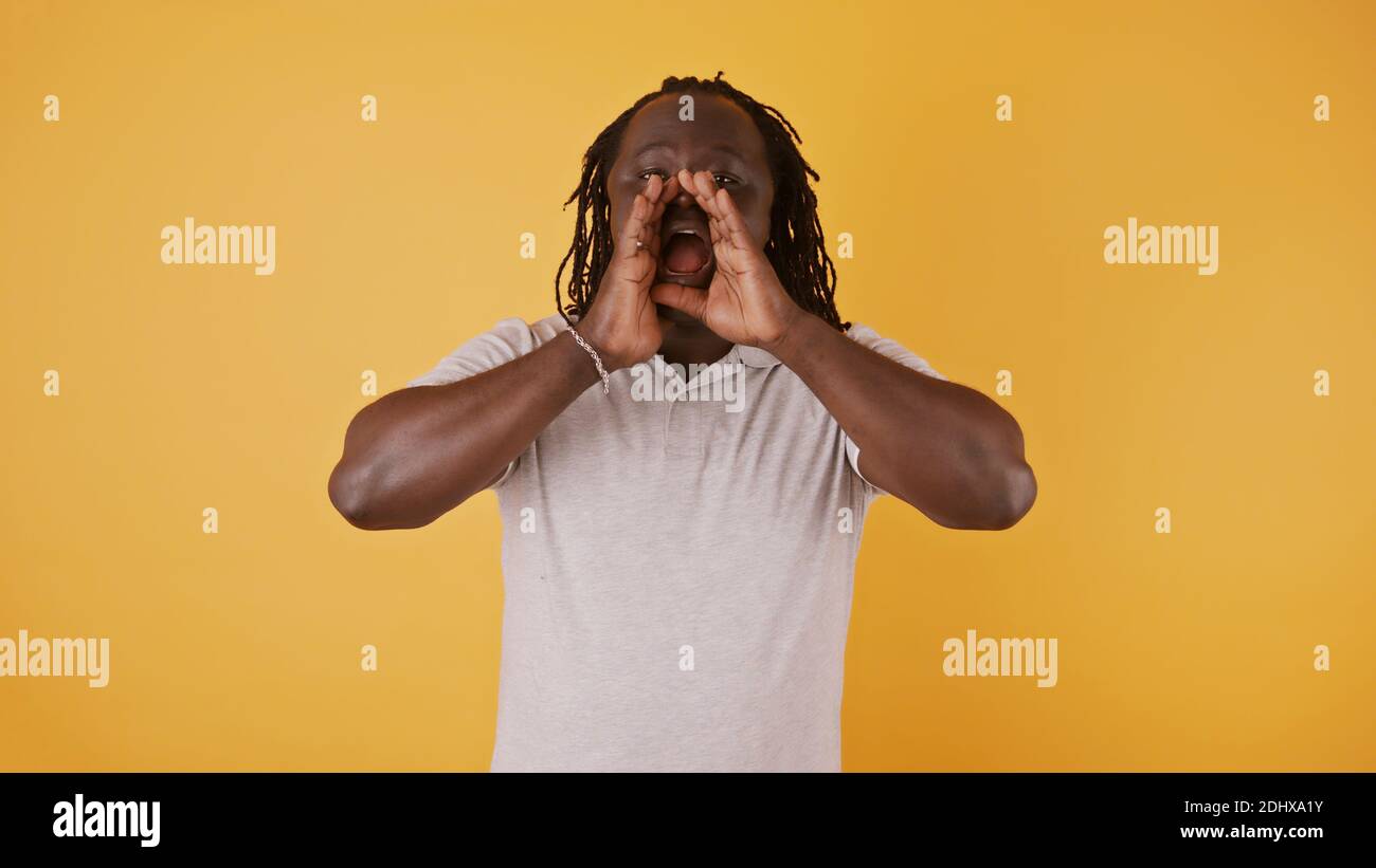Hand over mouth african hi-res stock photography and images - Alamy