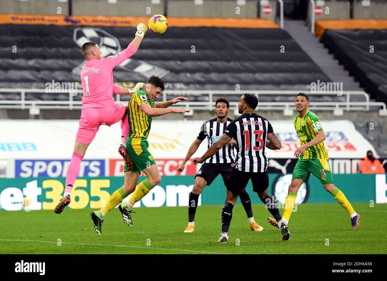 West Bromwich Albion goalkeeper Sam Johnstone punches the ball clear as ...