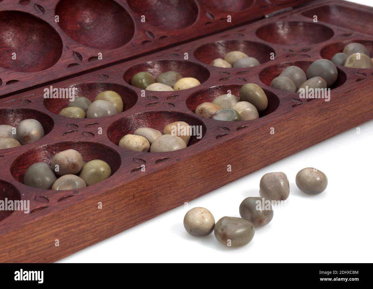 Awale, African Game against White Background Stock Photo - Alamy