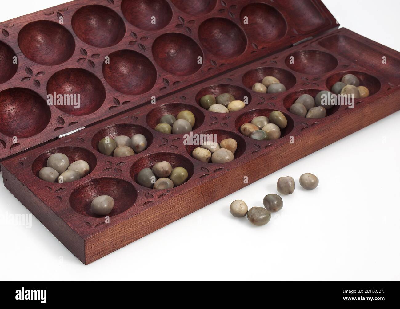 Awale, African Game against White Background Stock Photo - Alamy