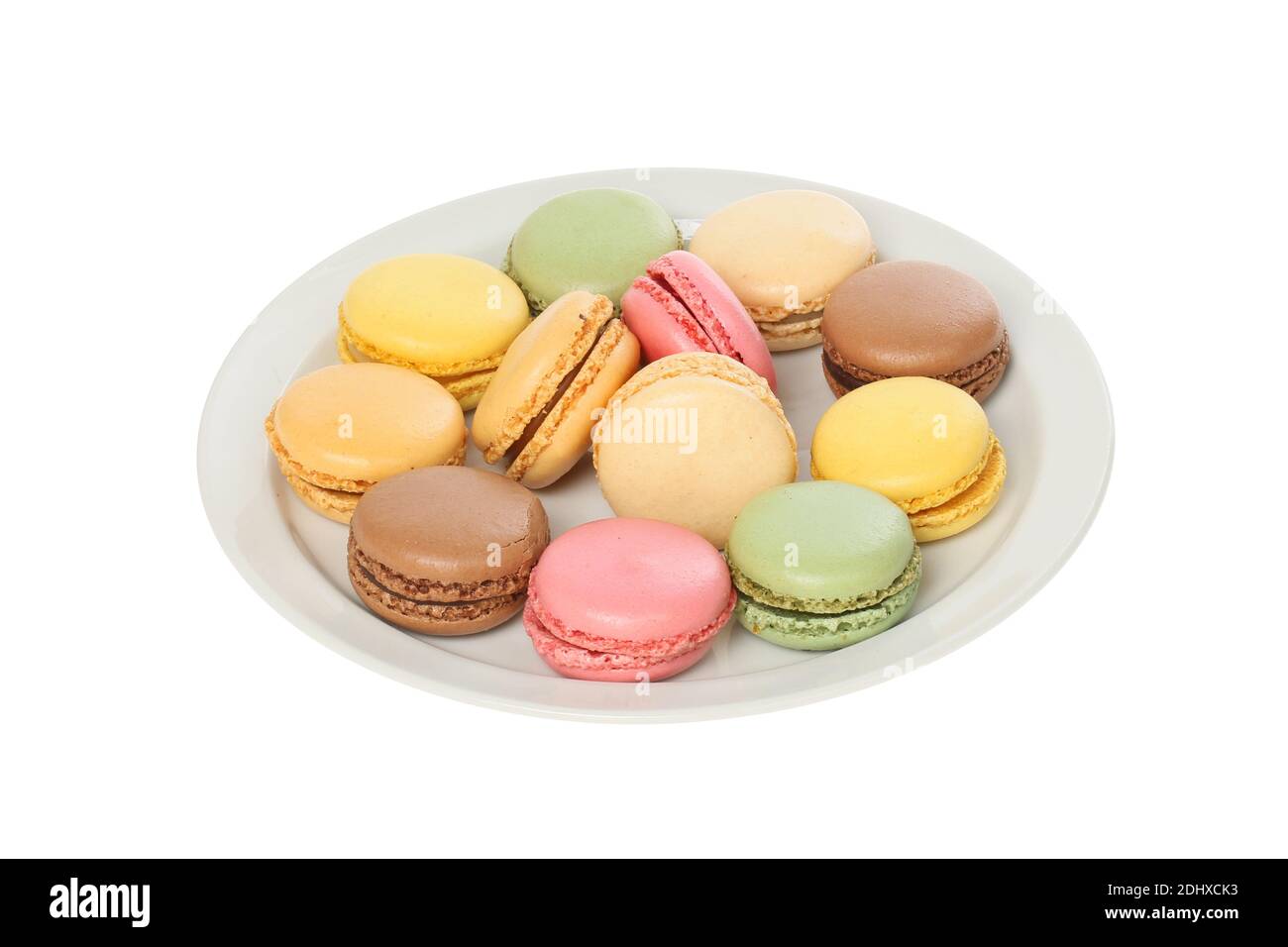 Selection of macarons on a plate isolated against white Stock Photo - Alamy