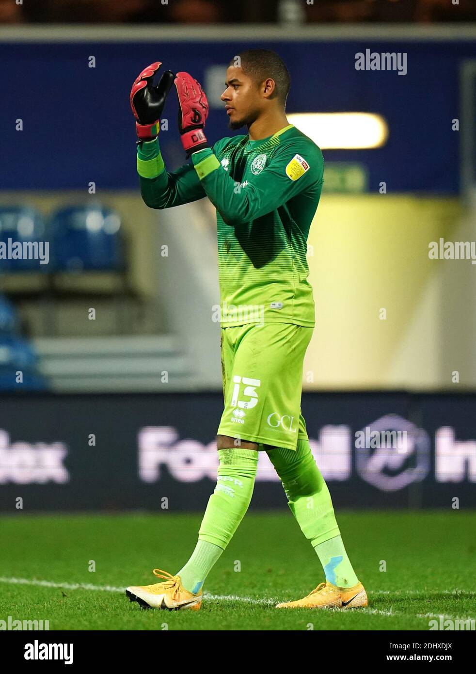 A dejected Queens Park Rangers goalkeeper Seny Dieng applauds the fans ...