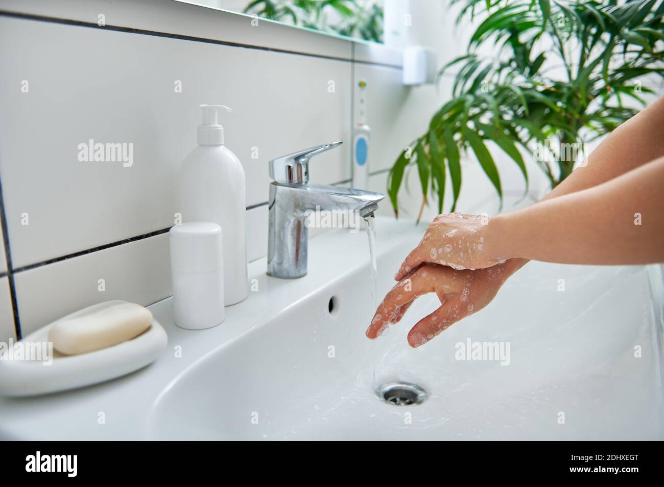 Focus on washing Hands. Cleaning Hands. Hygiene routine Stock Photo - Alamy