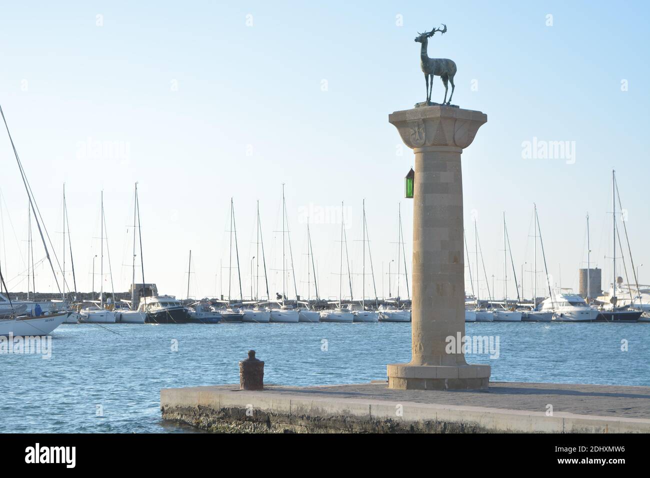 statue in the old port of rhodes Stock Photo - Alamy