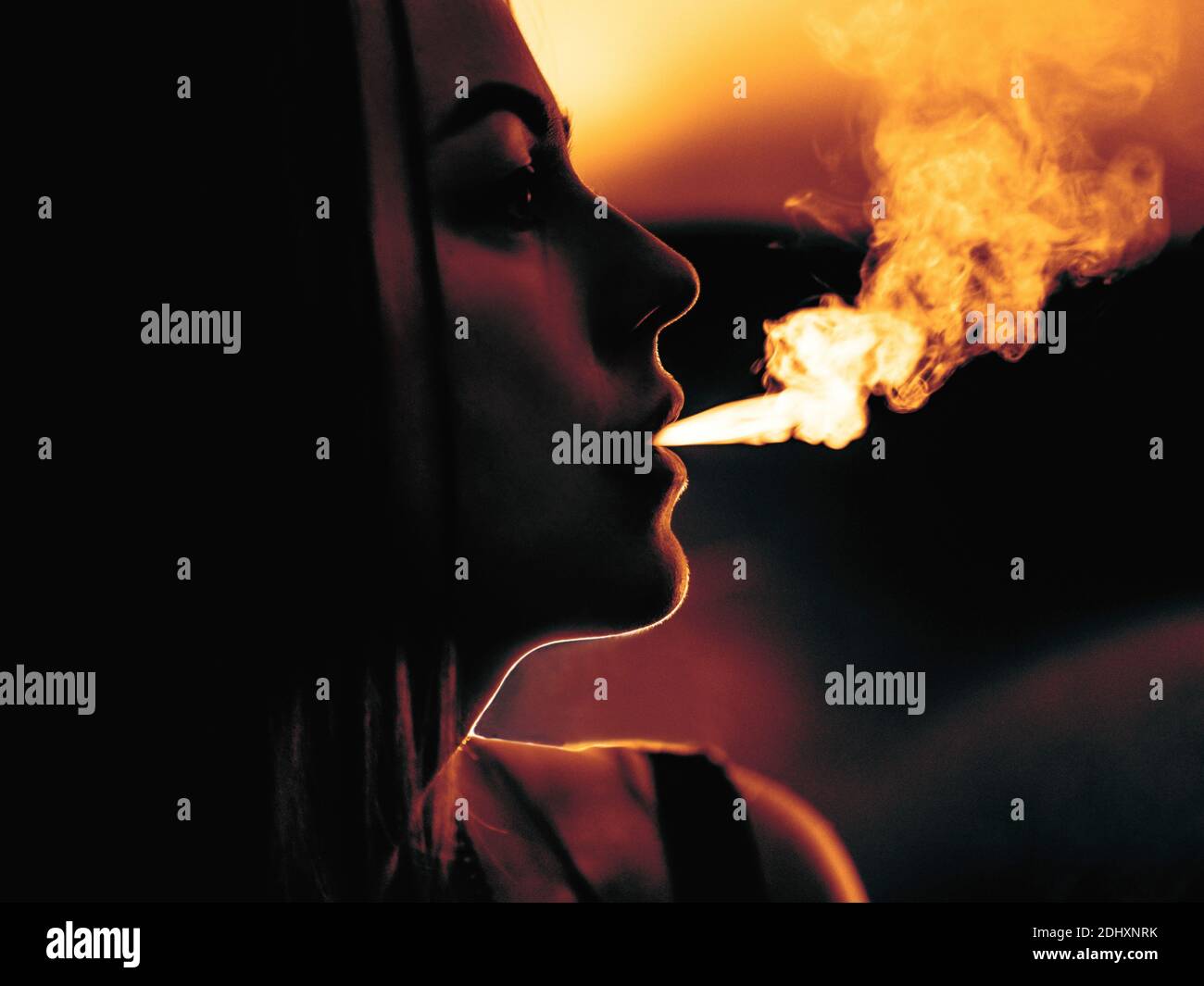 Smoking cigarette side view hi-res stock photography and images - Alamy
