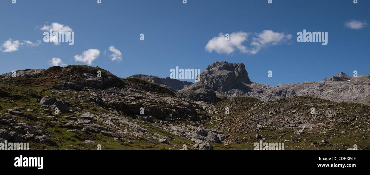 panoramic mountains with big peaks and a blue sky with clouds Stock ...