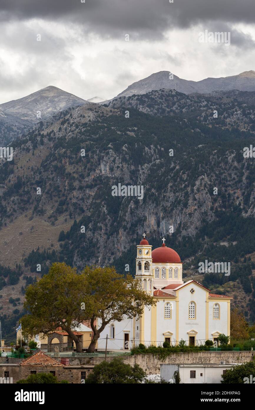 Agios Antonios orthodox church in the village of Lakkoi with mountains ...