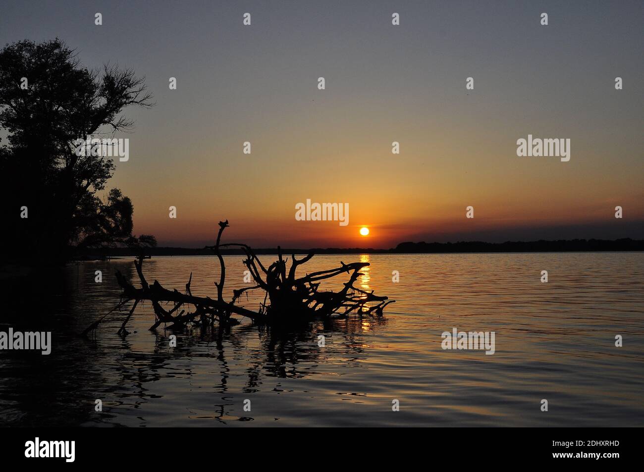 Sunset in the river Stock Photo - Alamy