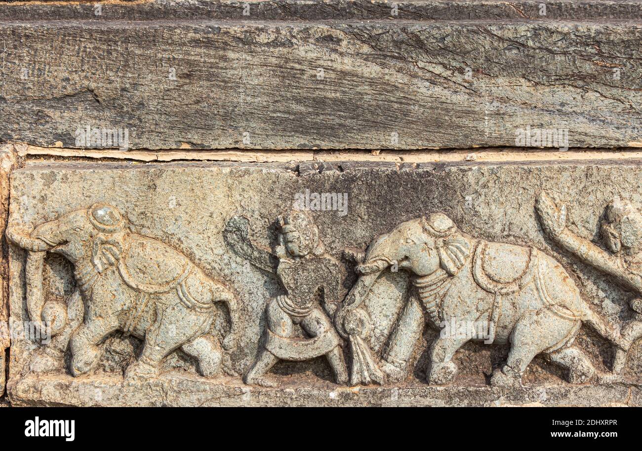 Hampi, Karnataka, India - November 4, 2013: Mural sculpture on stone at ...