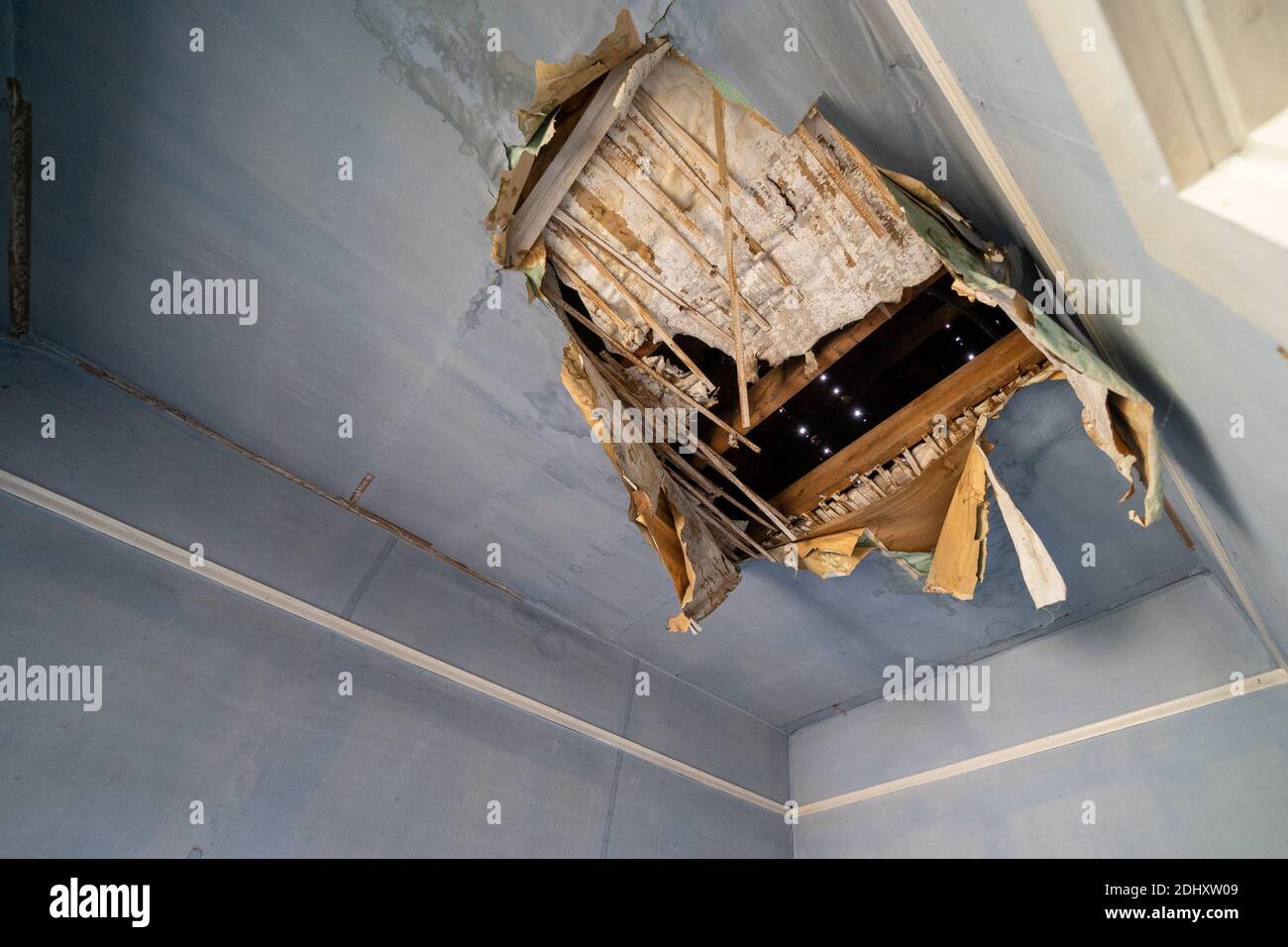 Collapsing ceiling in an abandoned home, in desperate need of repair ...
