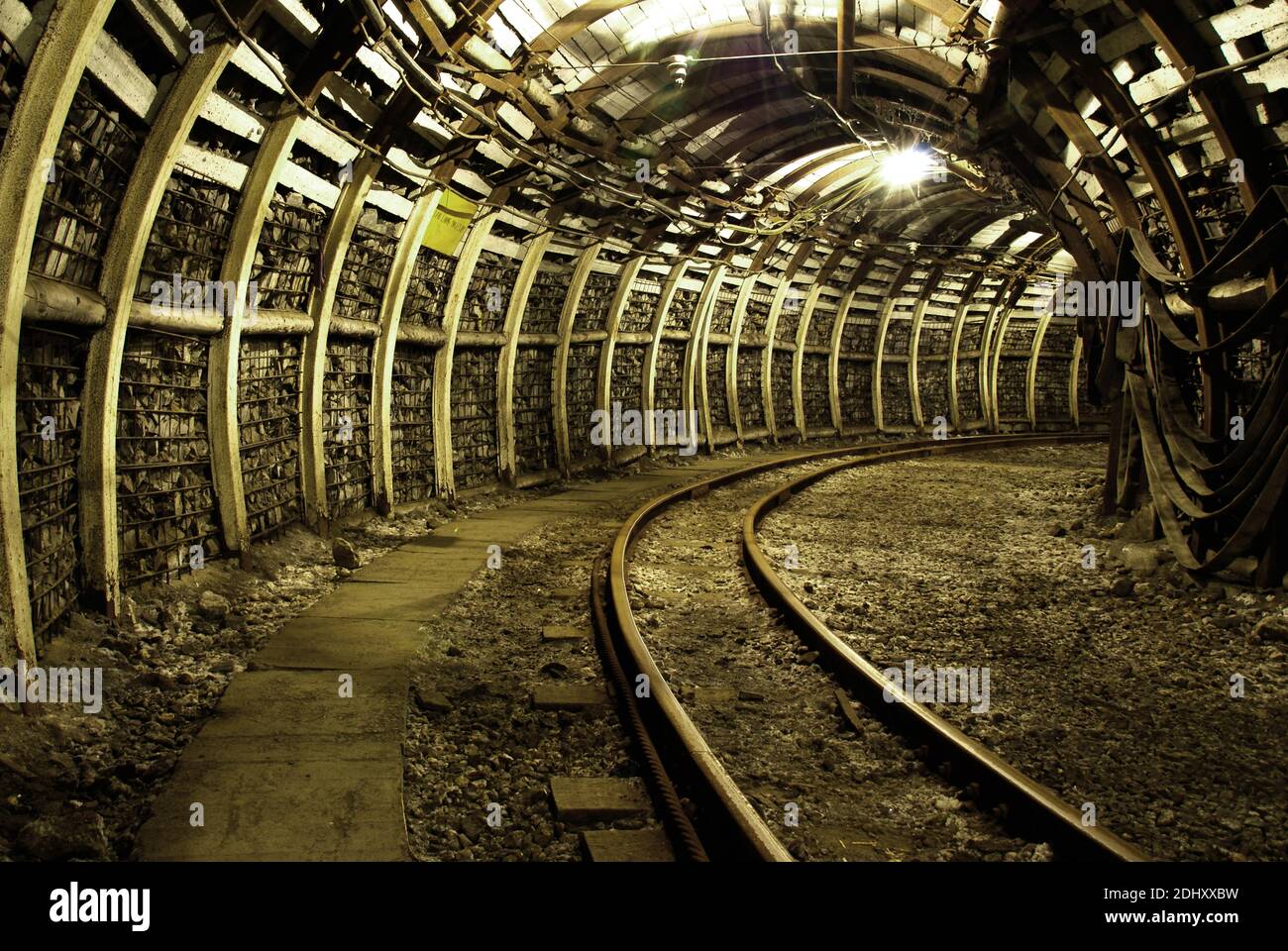 Railroad track in a mining tunnel Stock Photo - Alamy
