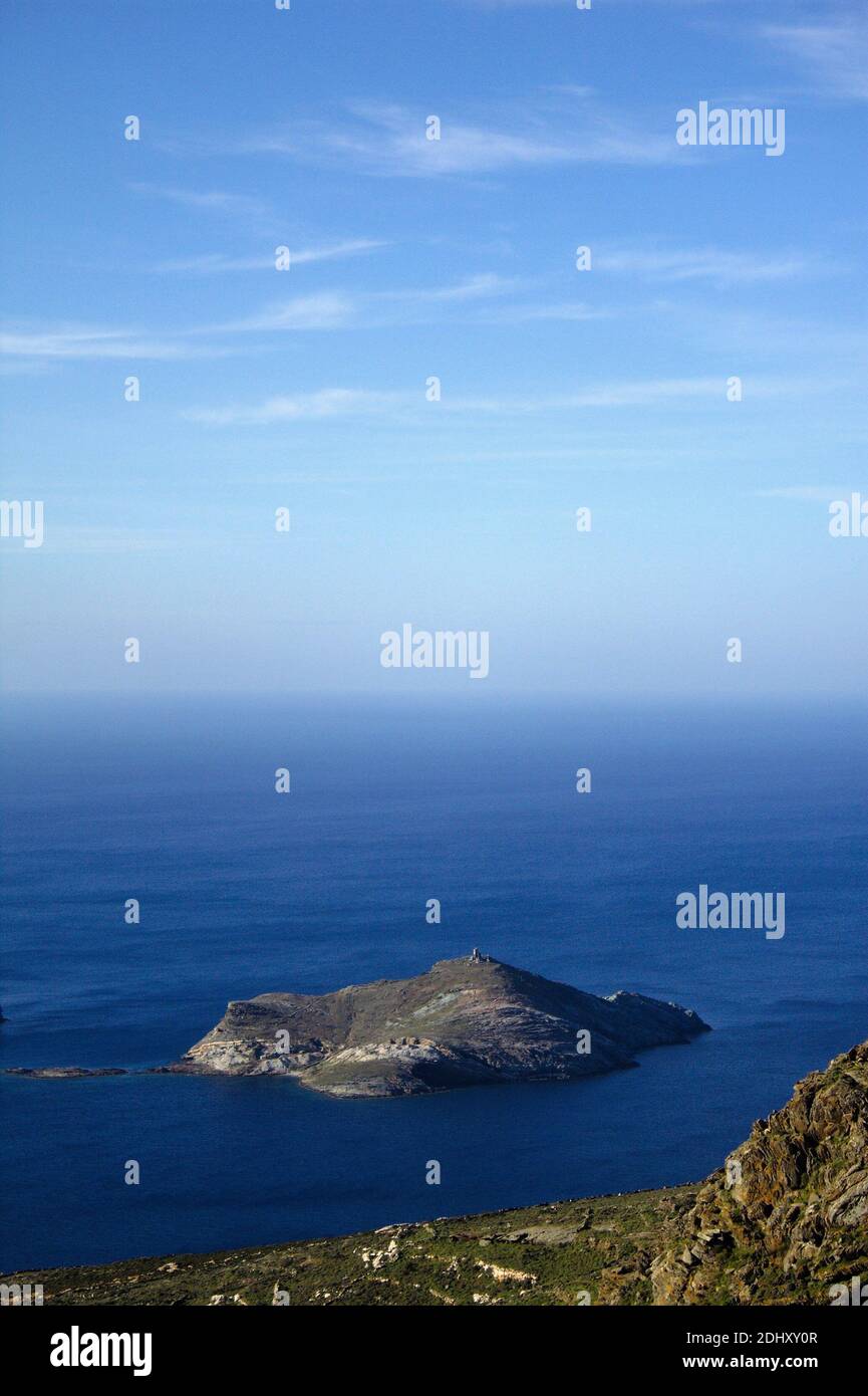View of Planitis isle north of Tinos island in Greece Stock Photo - Alamy