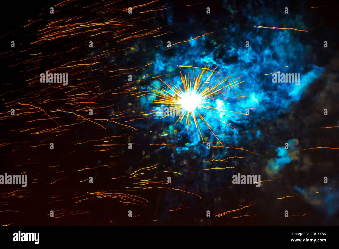 Fireworks Explosion display in the dark night sky Stock Photo - Alamy