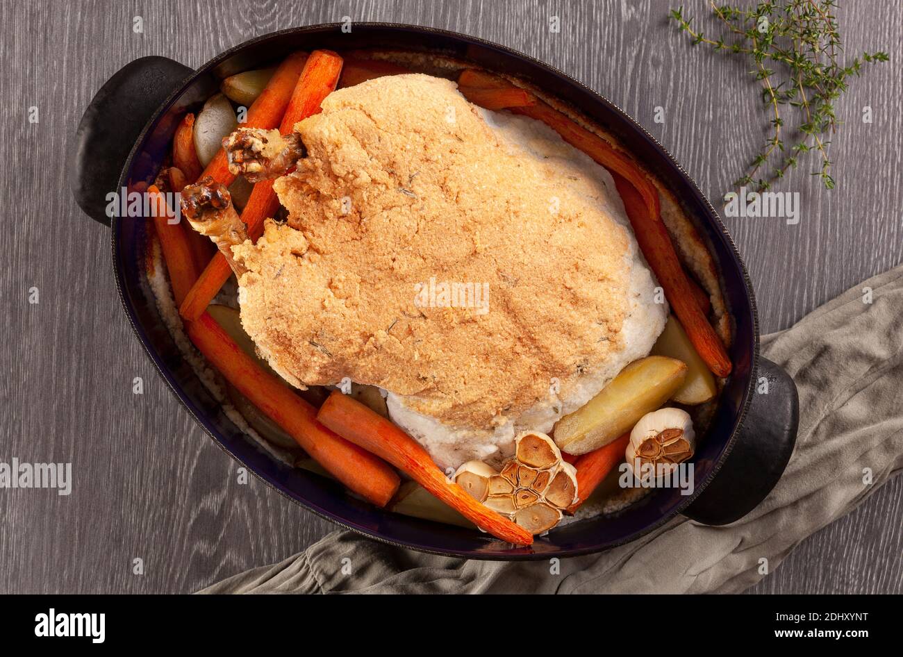 Whole salt crusted roast chicken with vegetables from above. Delicious ...