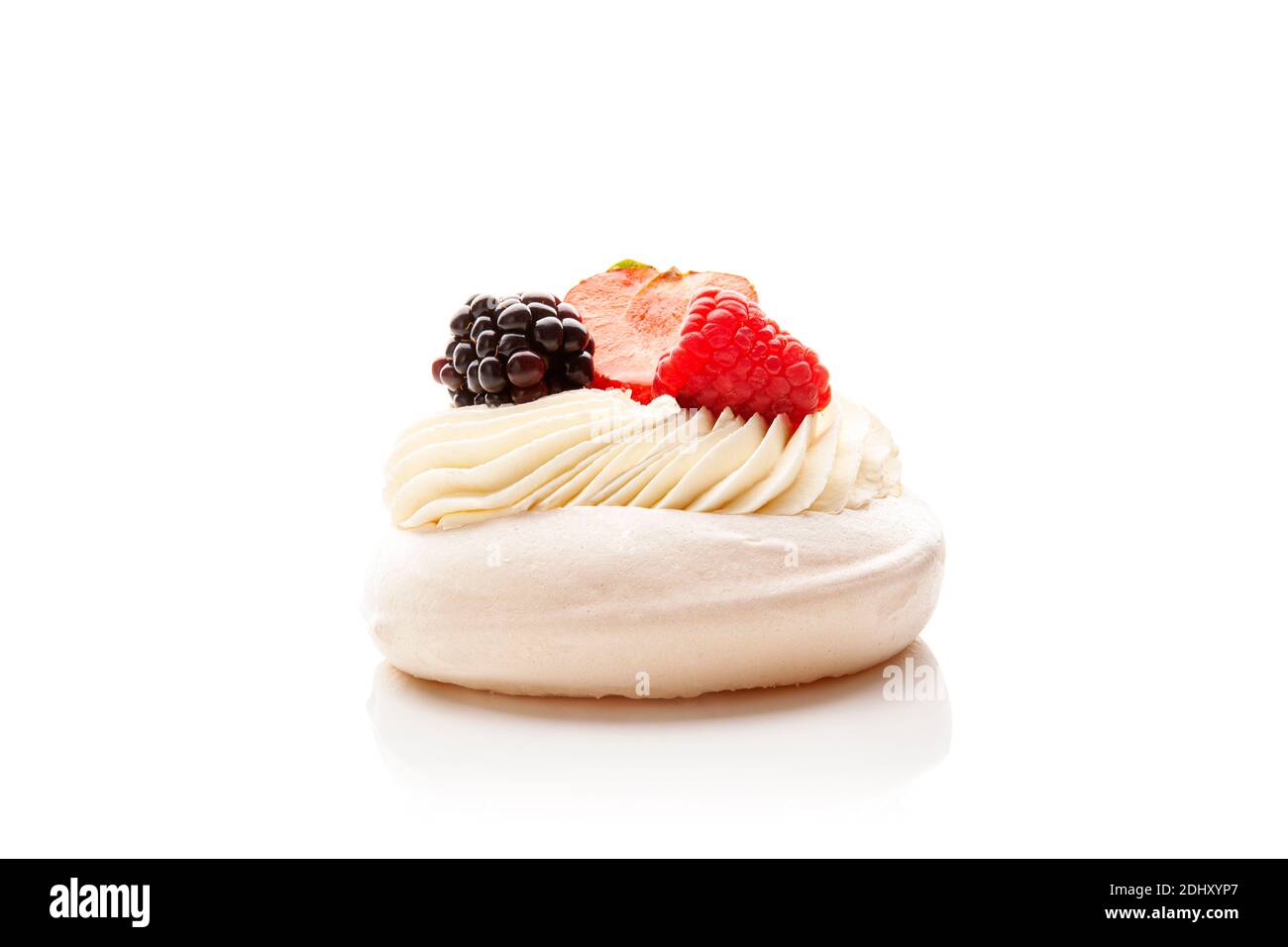 Delicious mini Pavlova meringue cake decorated with fresh raspberry ...