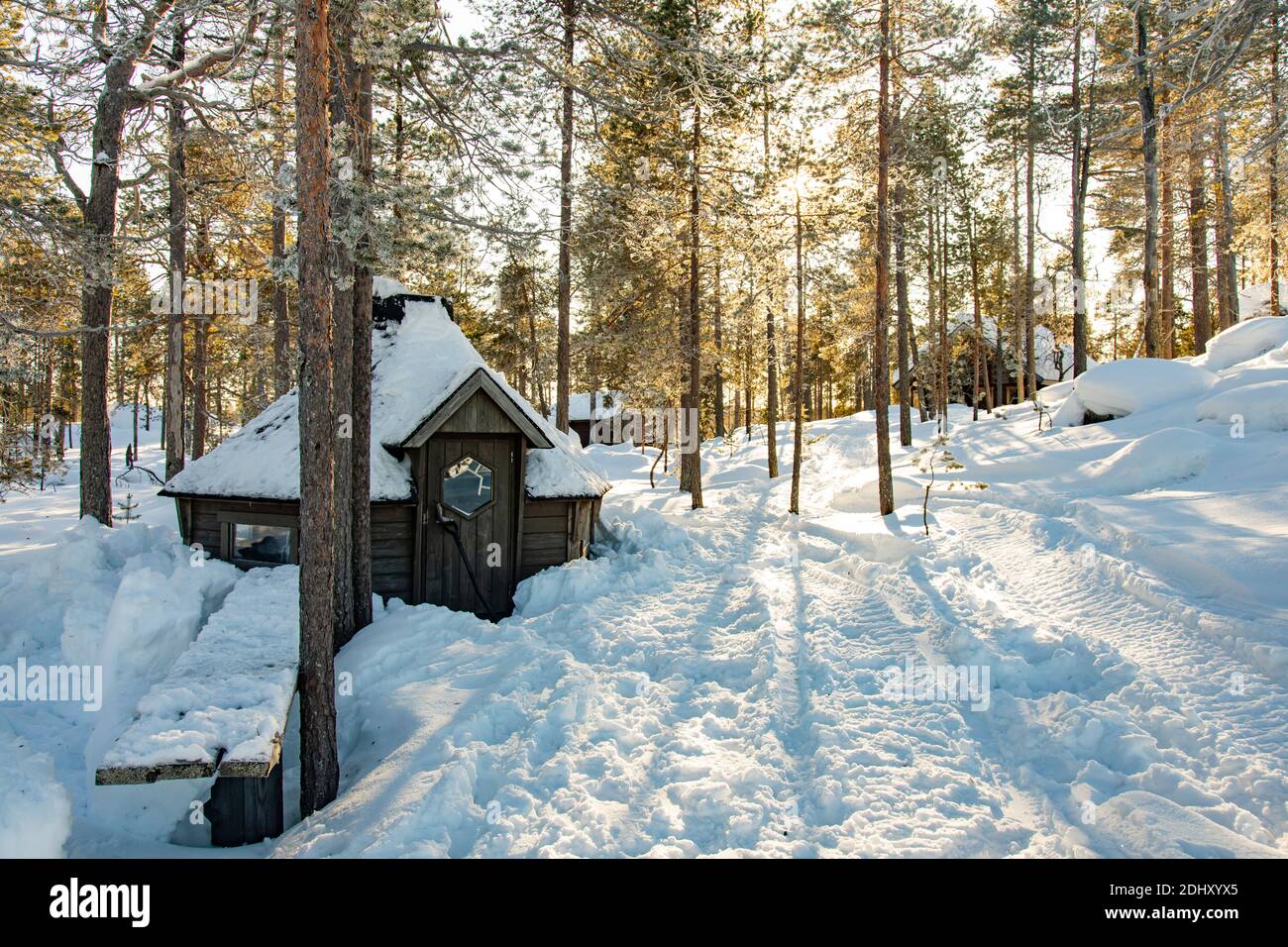 Inari, Lapland, Finland - March 2, 2020: typical mountain lodge covered ...