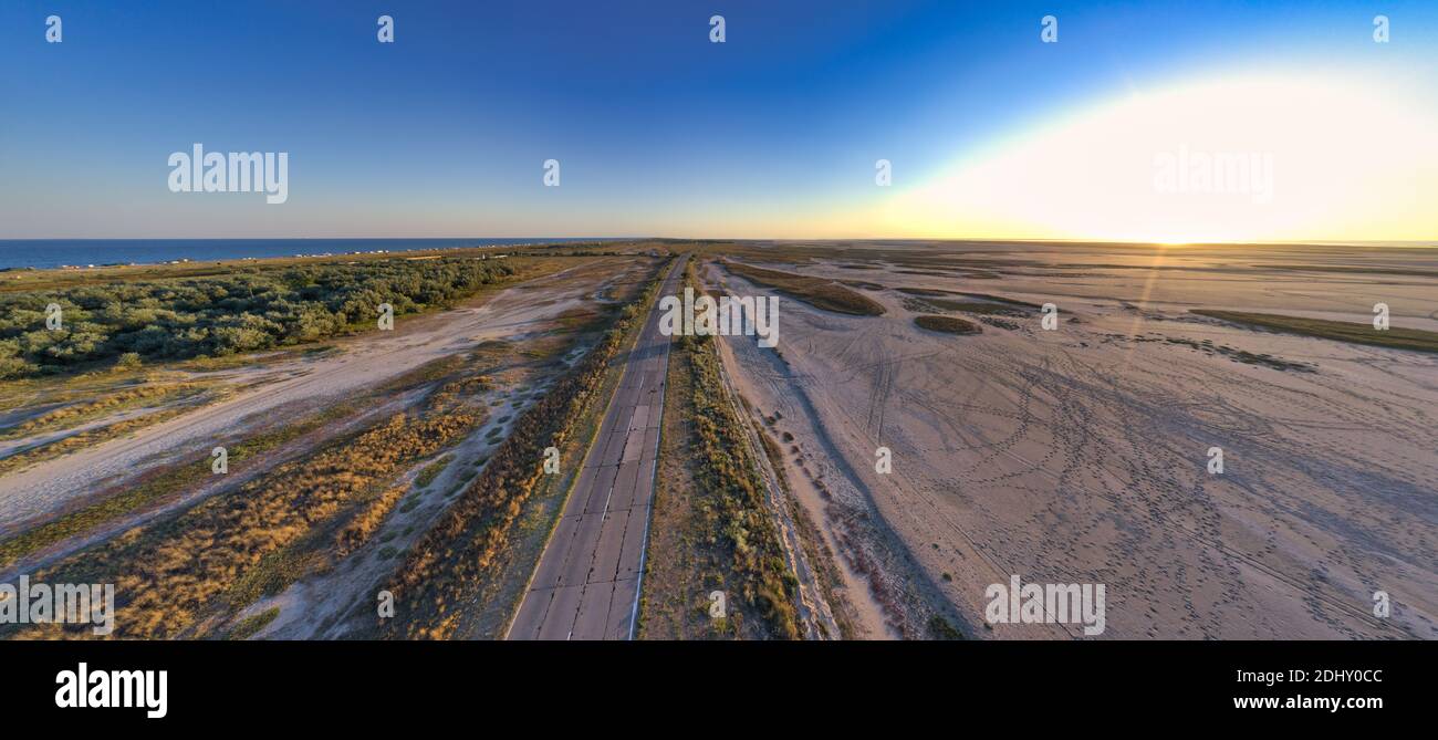 Wilderness road near the sea. Bird's eye view Stock Photo - Alamy