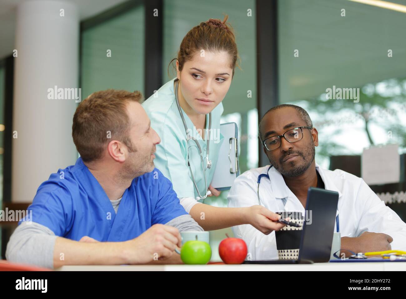 medical team interacting at the hospital Stock Photo - Alamy