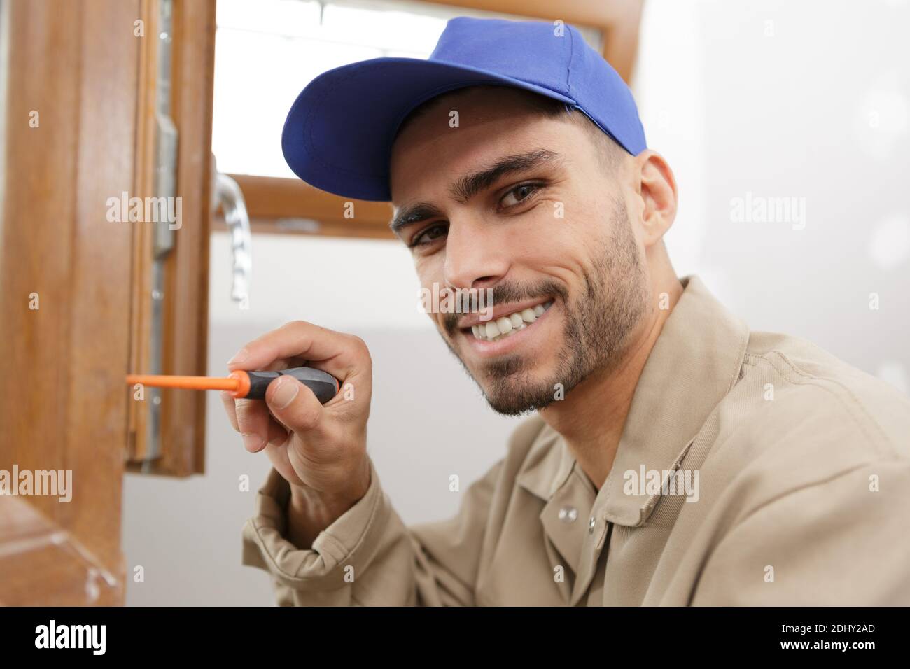 Fixing a window hi-res stock photography and images - Alamy