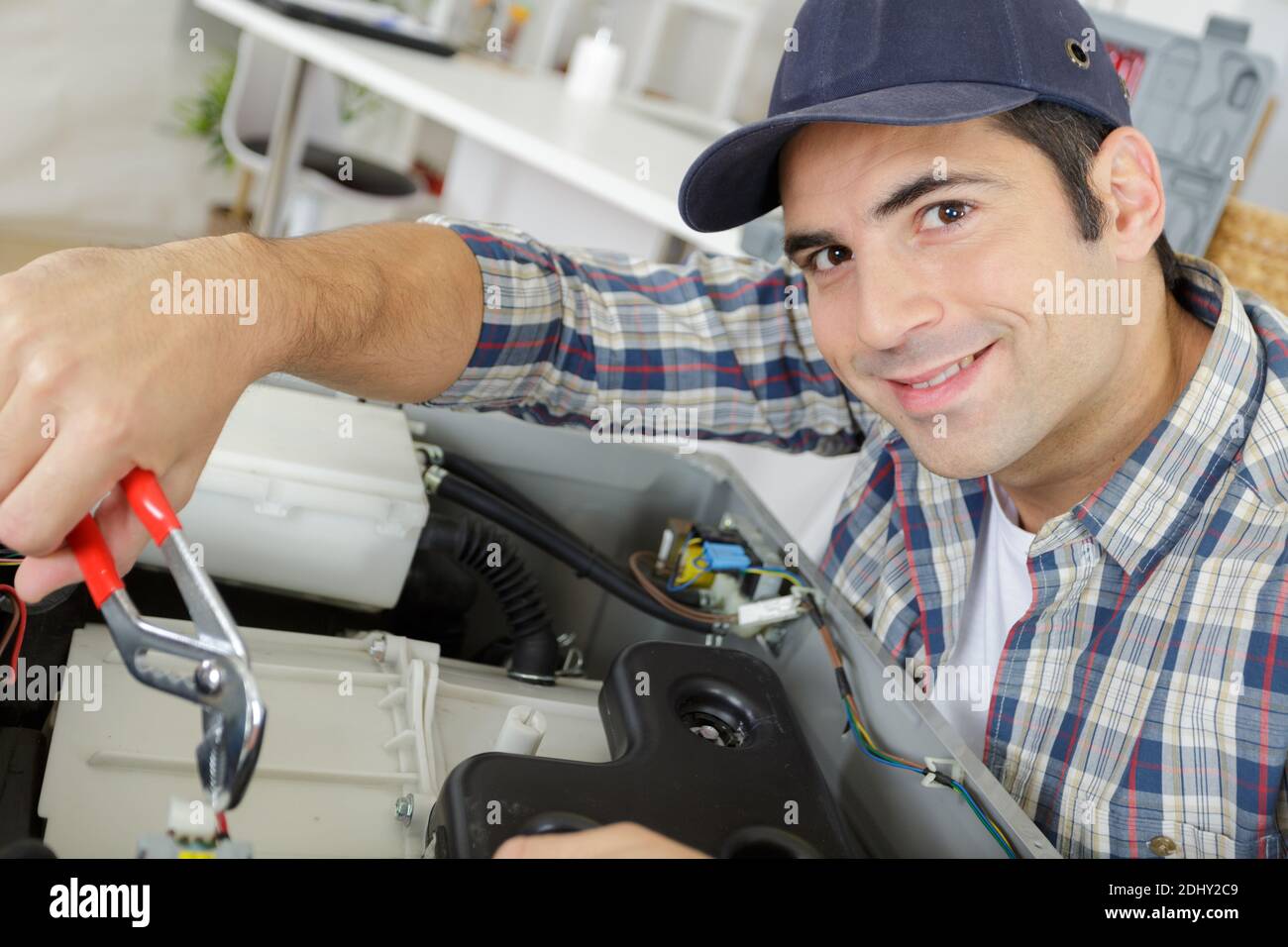 male technician repairing a digital photocopier machine Stock Photo - Alamy