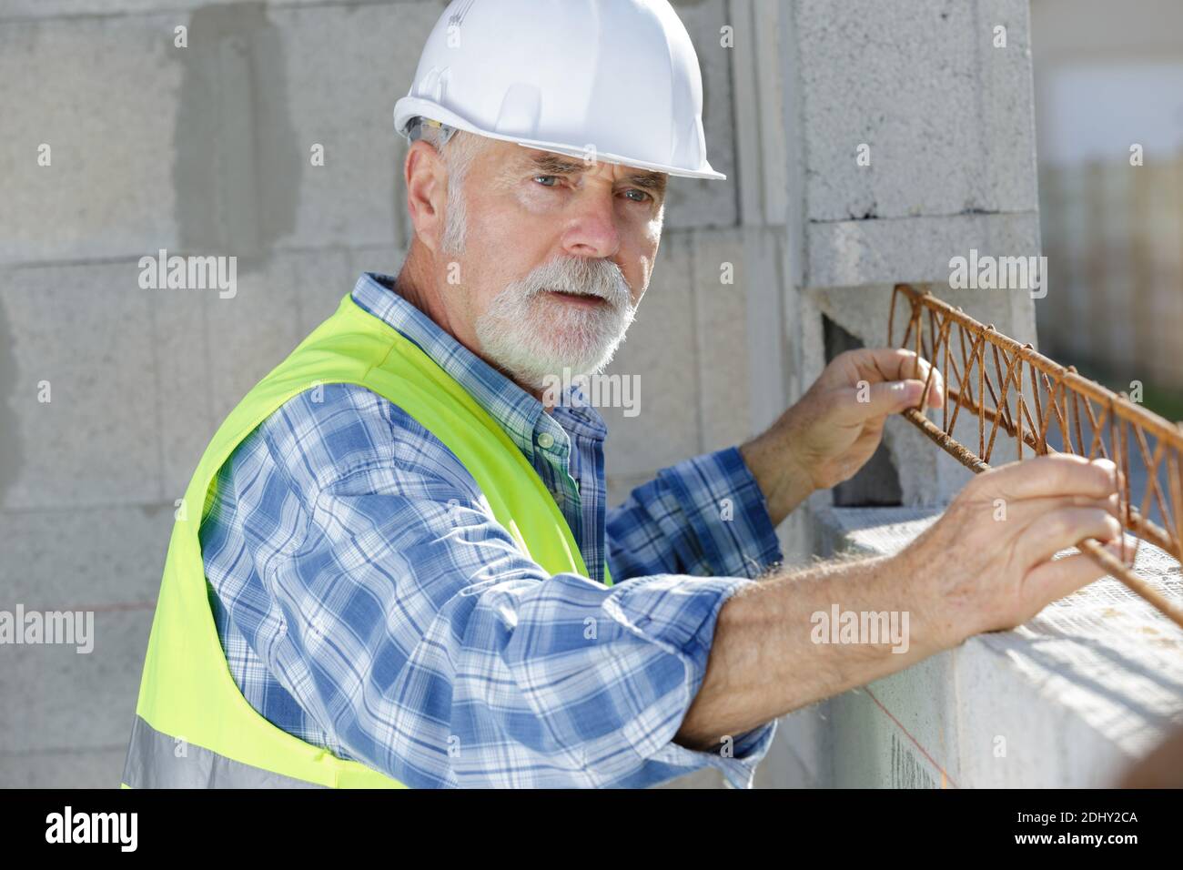 senior male worker working utdoors Stock Photo - Alamy