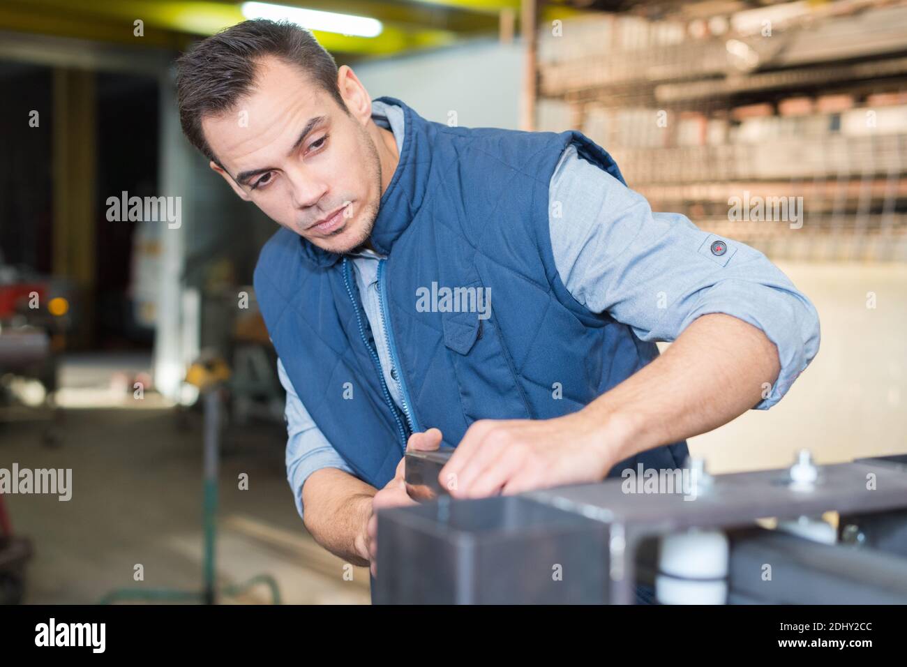 Male factory worker maintaining hi-res stock photography and images - Alamy