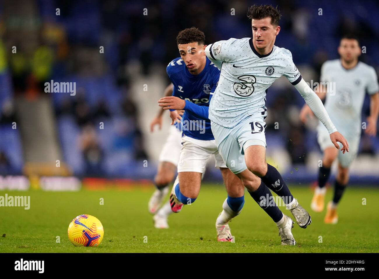 Everton's Ben Godfrey (left) and Chelsea's Mason Mount (right) battle ...