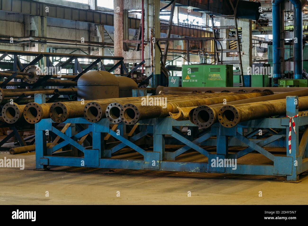 Metalworking workshop. Machine tools in pipe factory Stock Photo - Alamy