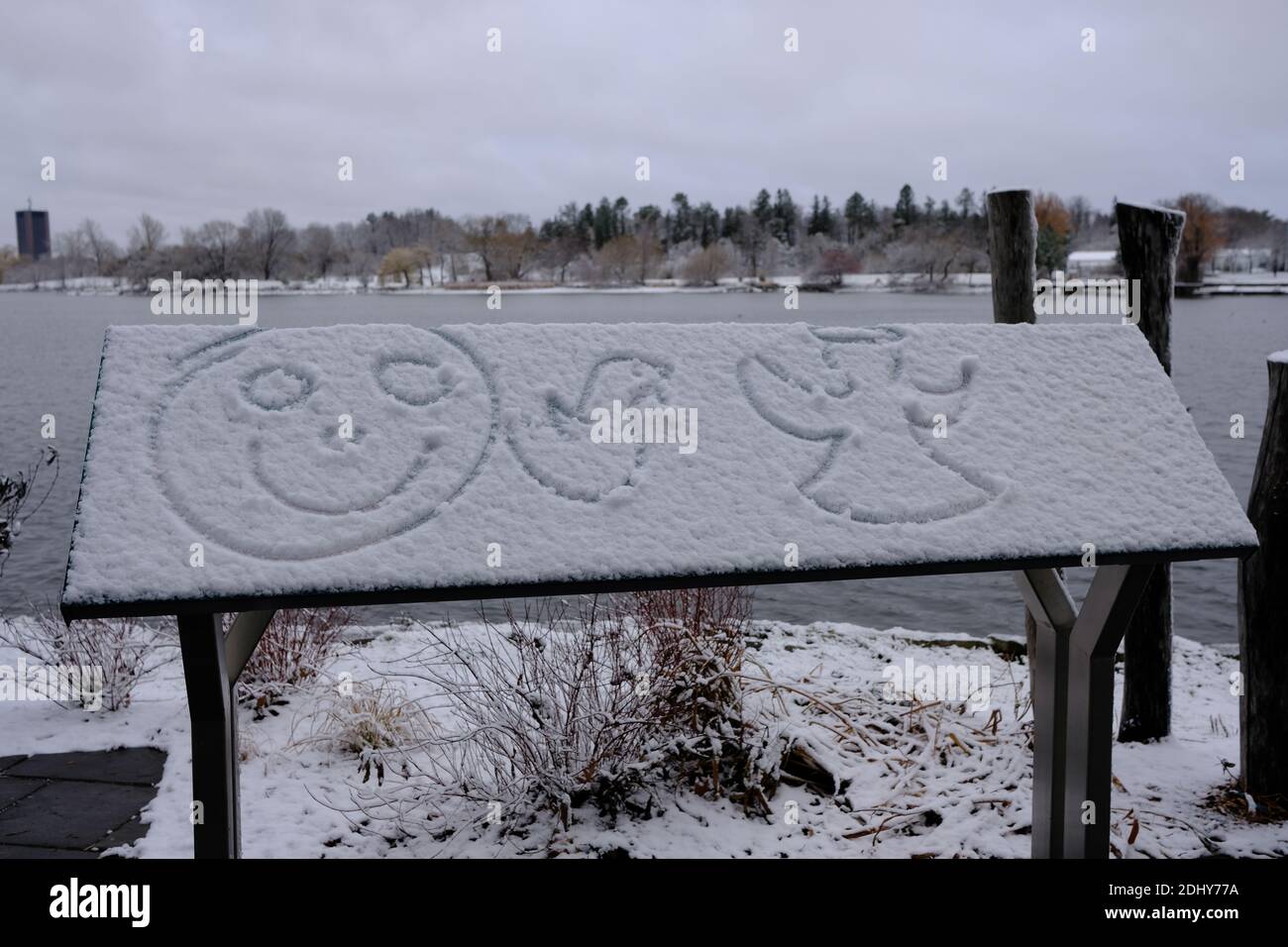 Smiley face drawn on snow hi-res stock photography and images - Alamy