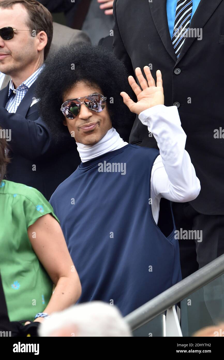 File Photo : Singer Prince watches from the stands Spain’s Rafael Nadal ...