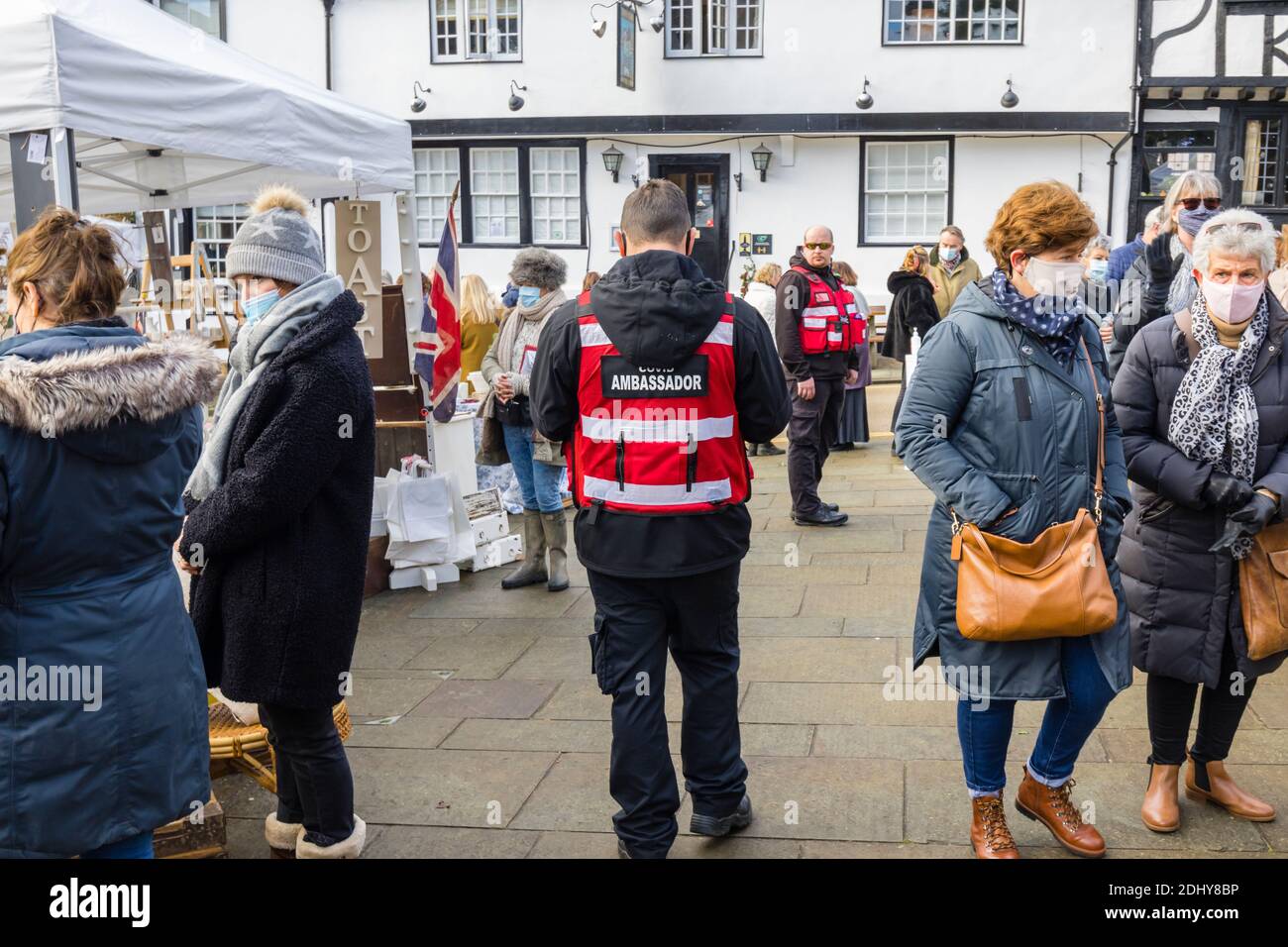 COVID ambassadors assist with social distancing and wearing face ...