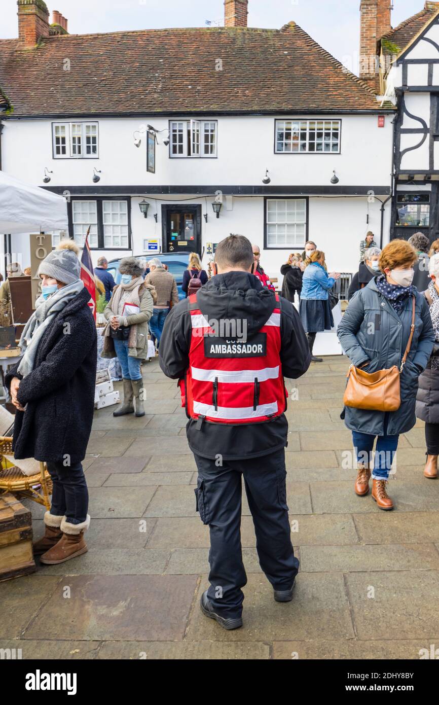 COVID ambassadors assist with social distancing and wearing face ...