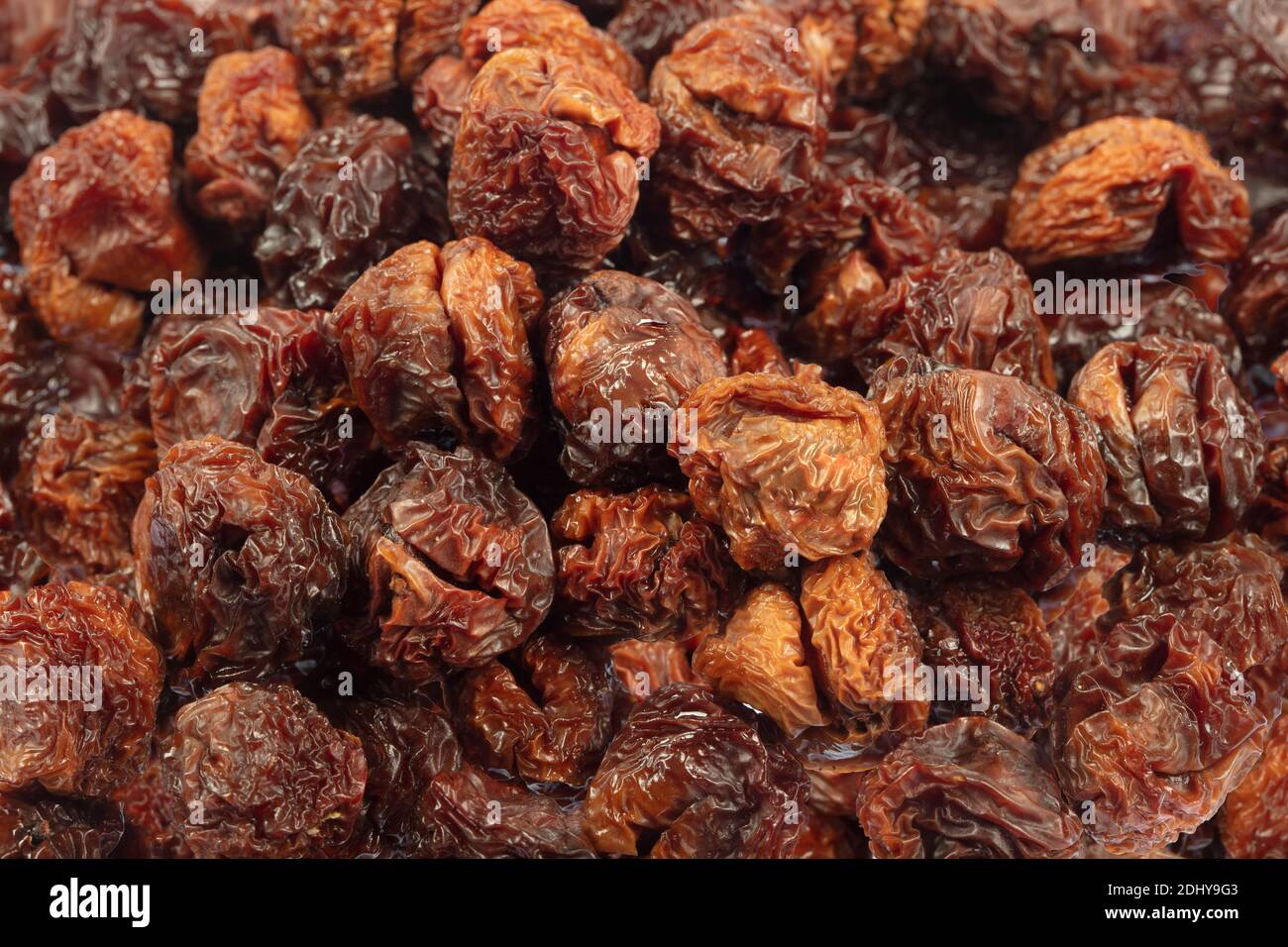 Dried plum - prunes isolated on a white background. Top view. Flat lay ...