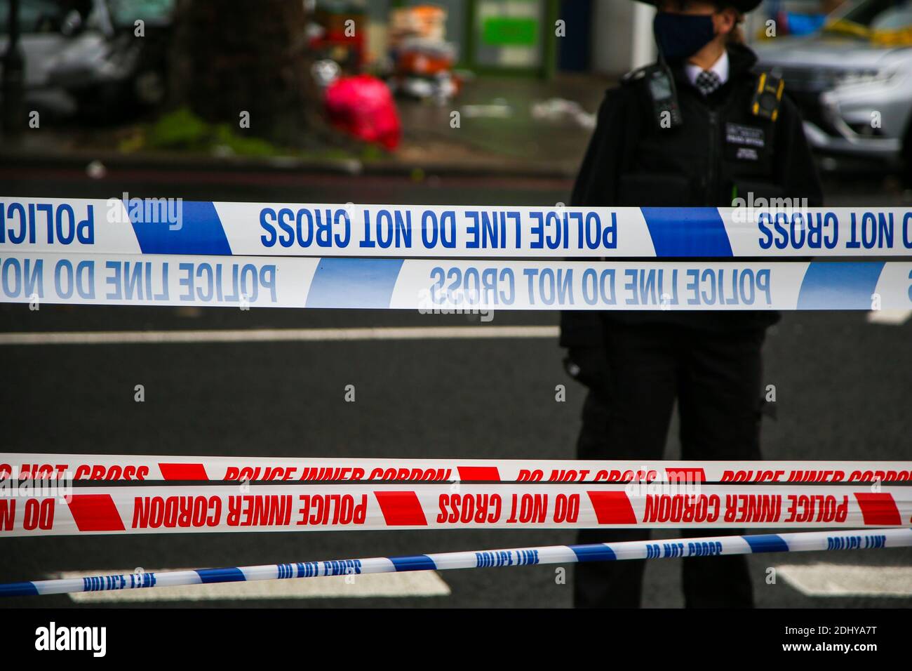 London, UK. 11th Dec, 2020. Police tapes are seen around a crime scene ...