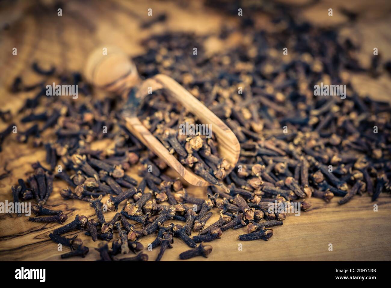 dried clove on olive wood Stock Photo - Alamy