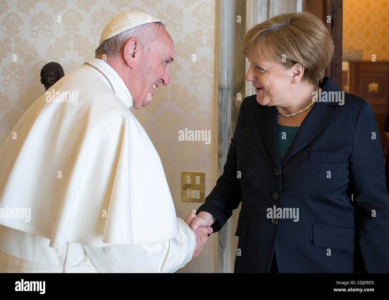 Pope Francis meets German Chancellor Angela Merkel at the Vatican on ...