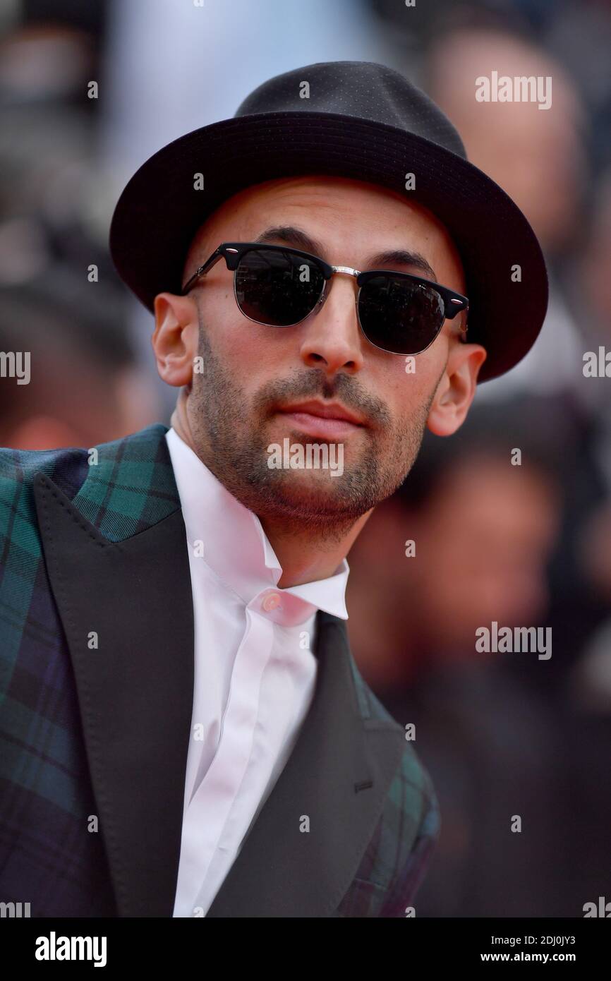 Artist JR attending the The BFG screening at the Palais Des Festivals ...