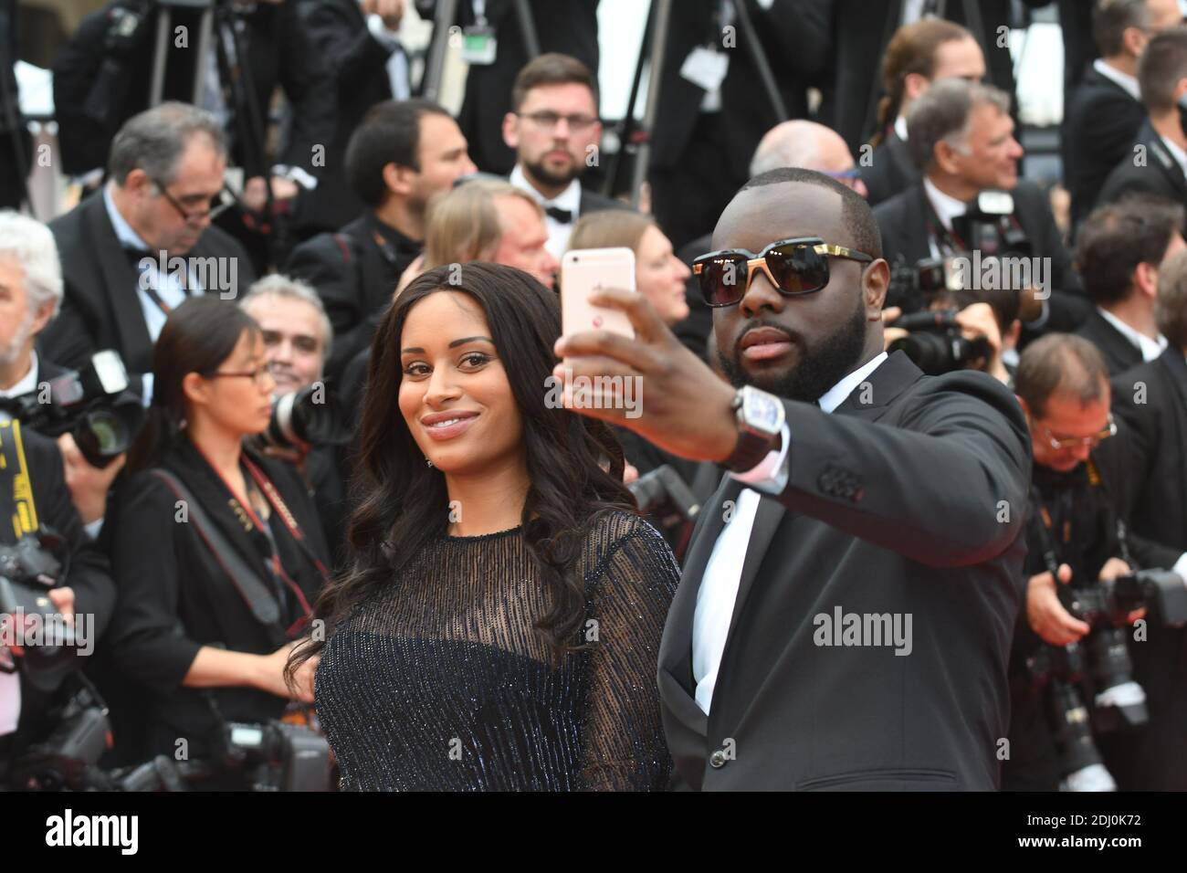 Maitre Gimms and girlfriend arrive for the screening of "The BFG" as ...