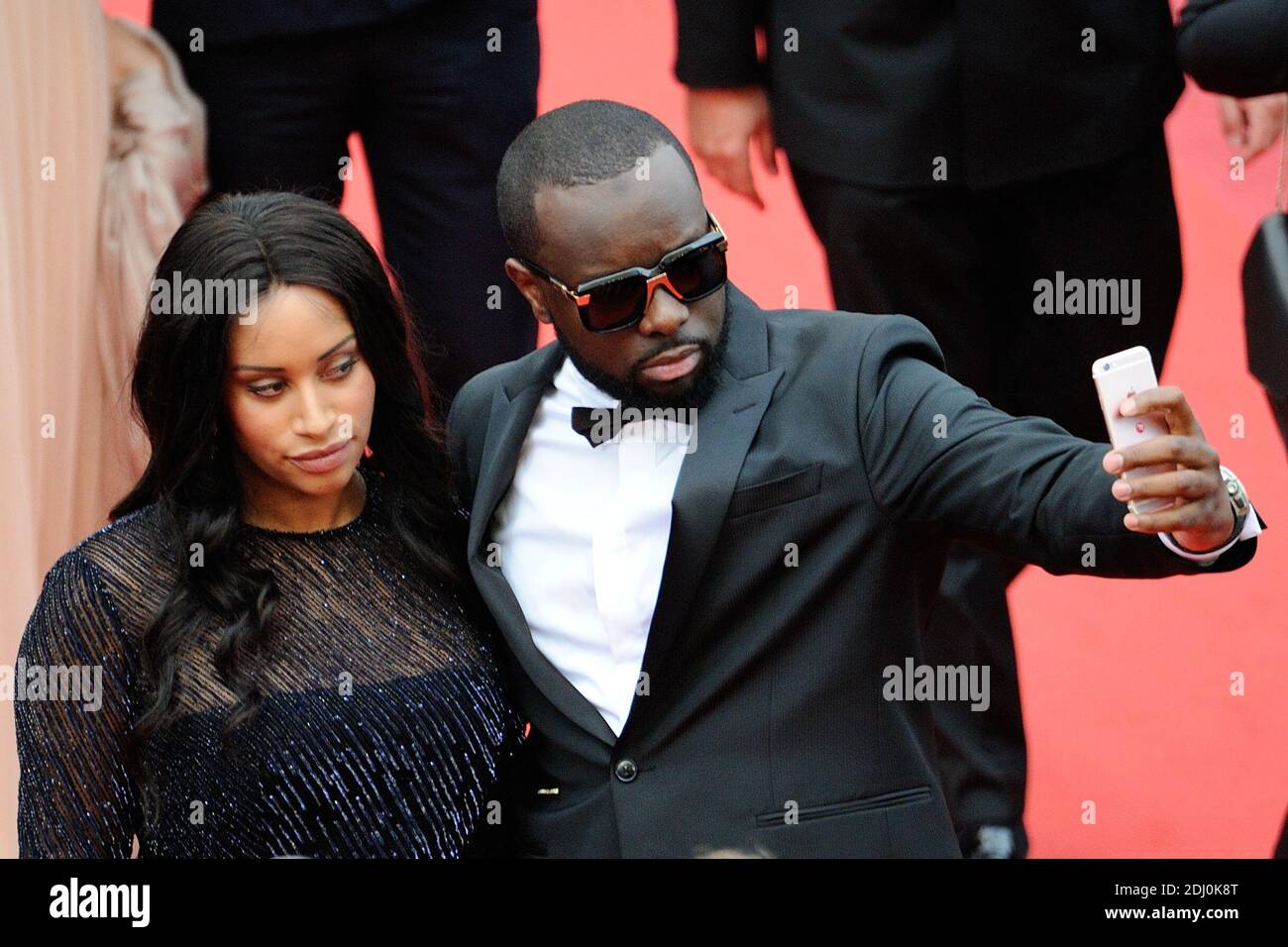 Maitre Gims and girlfriend attending 'The BFG' Screening at the Palais ...