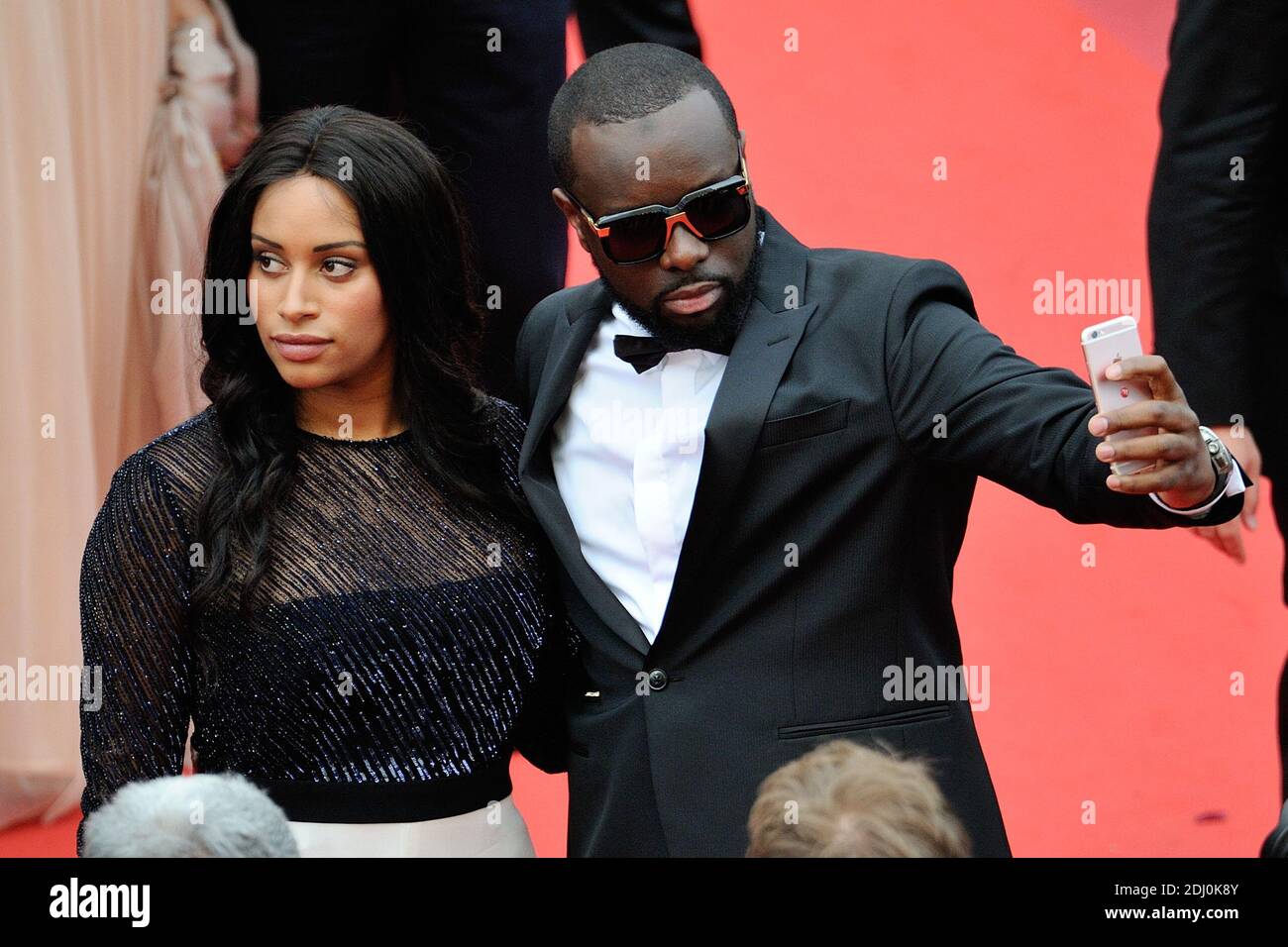 Maitre Gims and girlfriend attending 'The BFG' Screening at the Palais ...