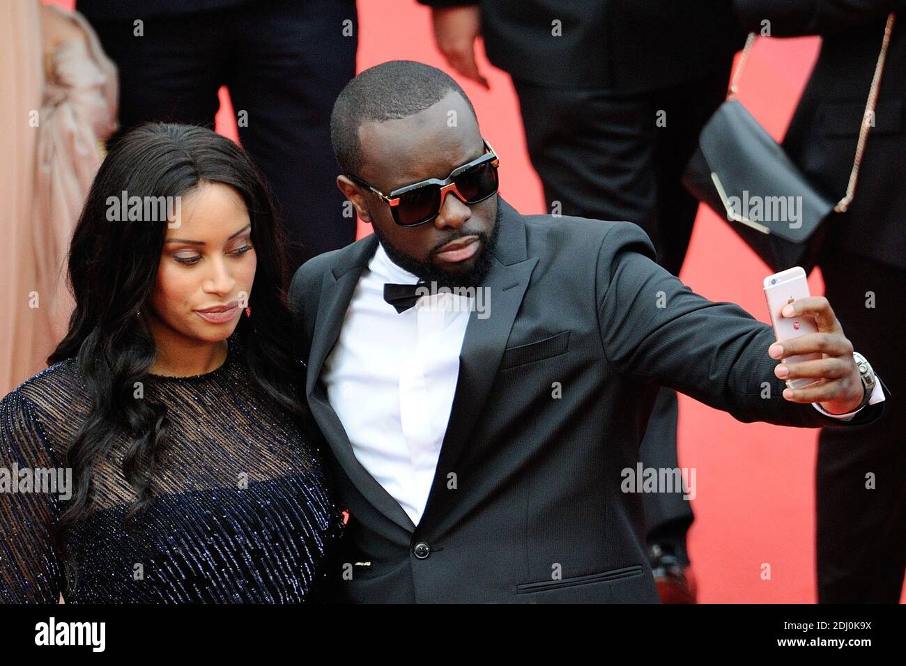Maitre Gims and girlfriend attending 'The BFG' Screening at the Palais ...