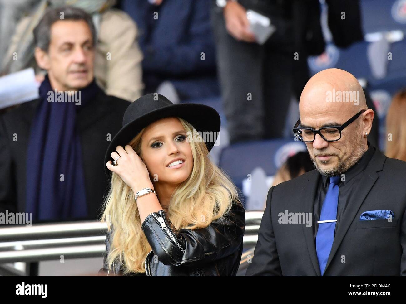 Pascal Obispo and wife during the French First League soccer match ...