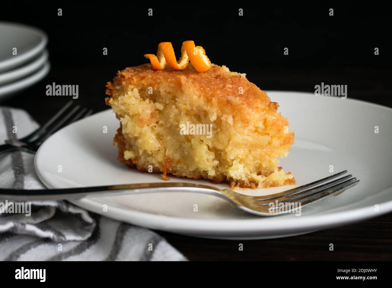 Greek Revani (Ravani) with Garnish: A slice of orange-coconut cake ...